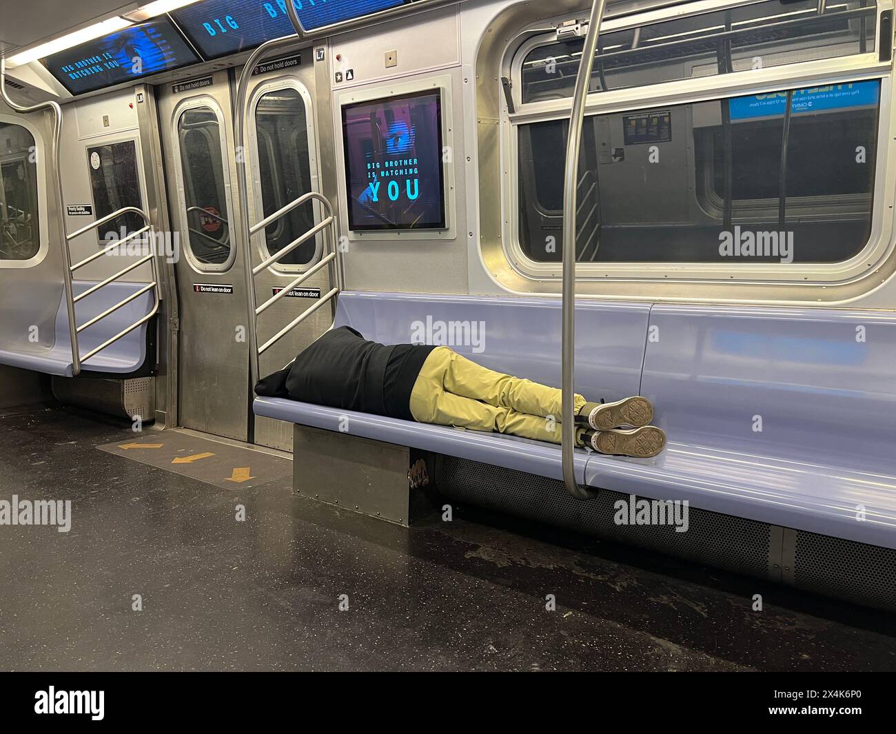Homeless man sleeping on train hi-res stock photography and images - Alamy