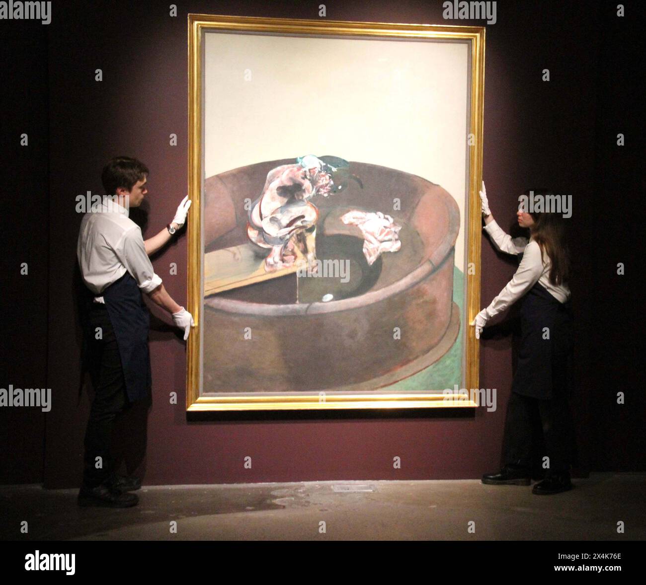 New York, New York, USA. 3rd May, 2024. Art handlers seen with artist Frances Bacon's Portrait ...