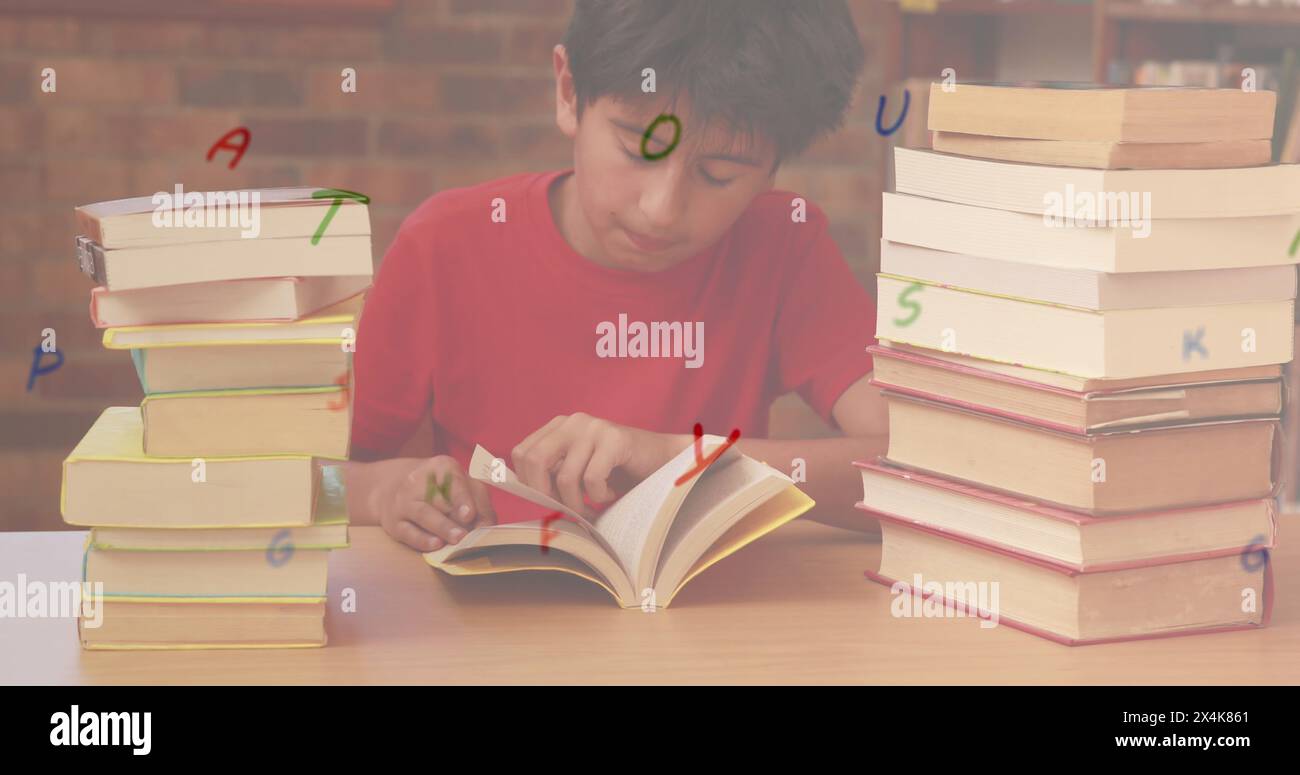 Digital composition of multiple alphabets floating against boy reading ...