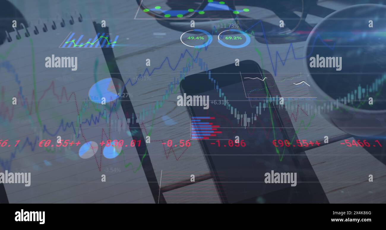 Image of financial data processing over desk with notebook and ...
