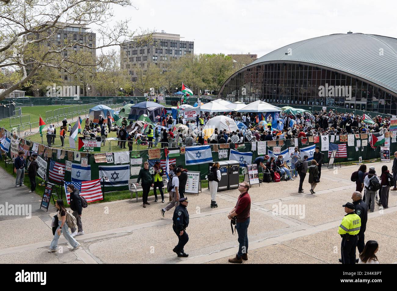 A general view of the MIT pro-Palestine rally with metal barricades now ...