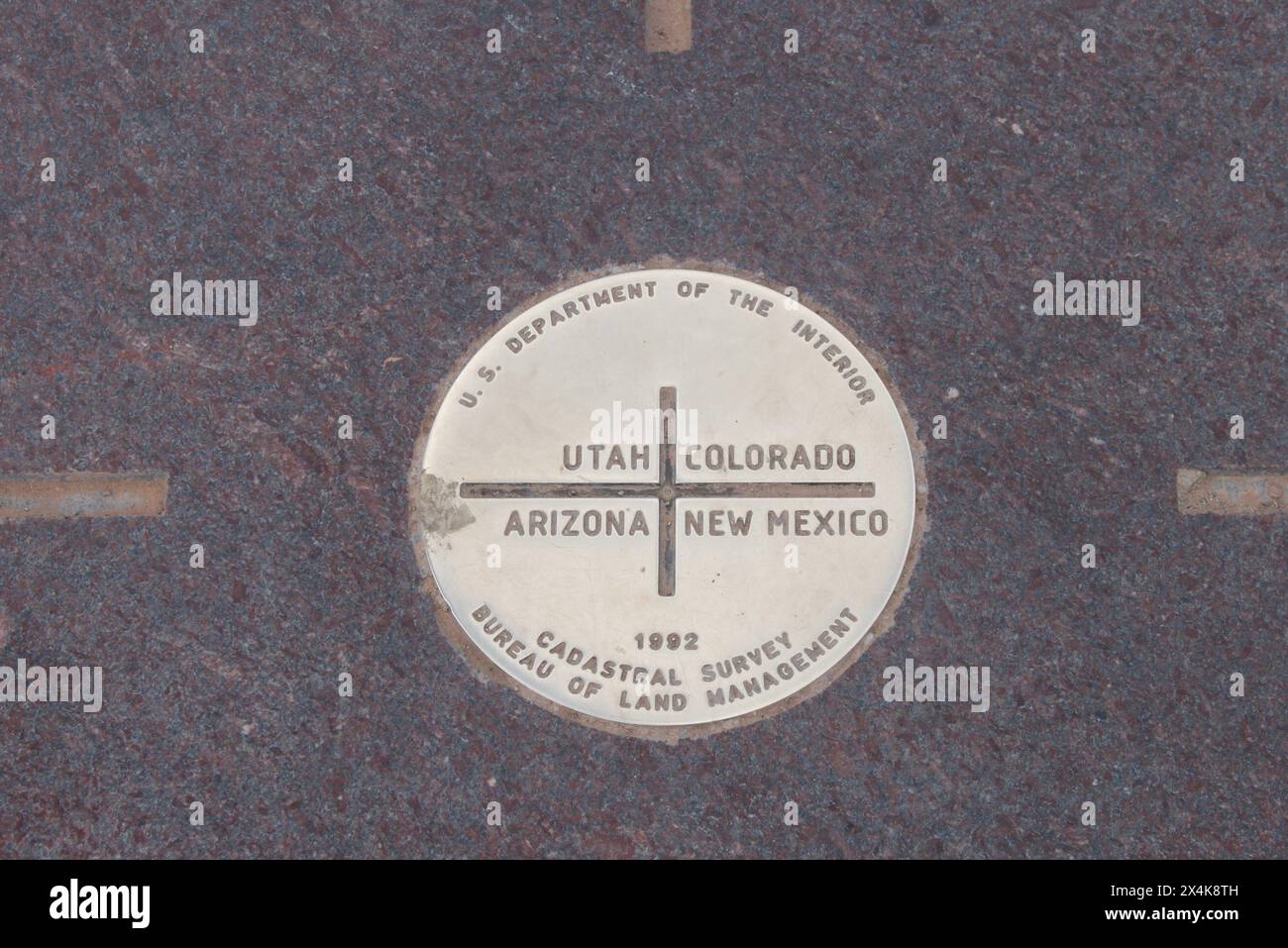 Four Corners metal marker in concrete USA Stock Photo - Alamy