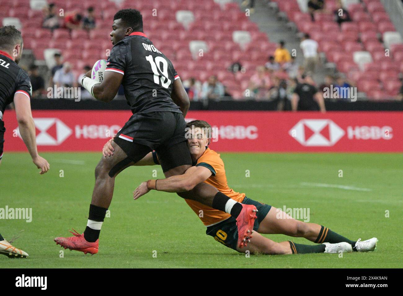 Singapore. 3rd May, 2024. Australia's Teddy Wilson (R) fights for the ...