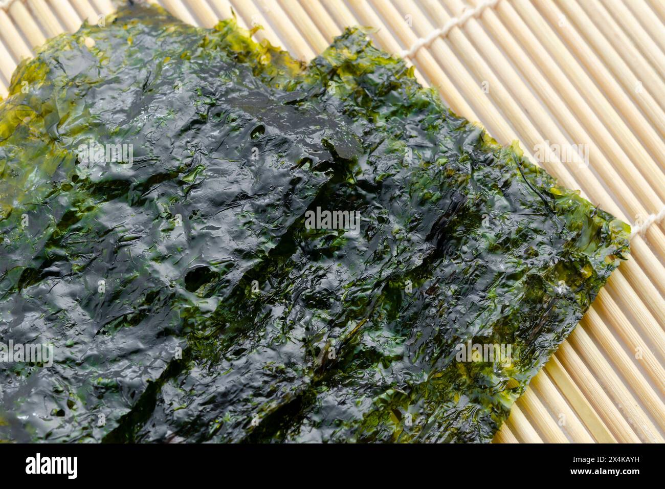 Japanese food nori dry seaweed sheets with salt on bamboo mat Stock ...
