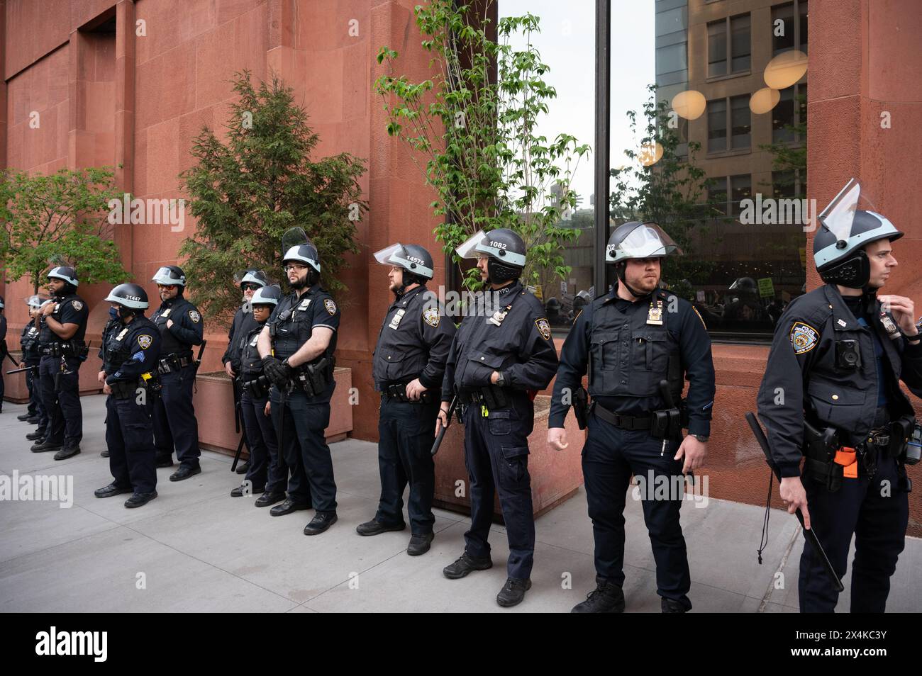 New York, USA, 3rd May 2024. NYPD officers stand away from the crowd of ...