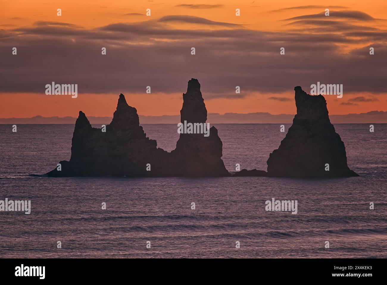 Long exposure at sunrise of the sea stacks offshore from Vik, Iceland ...