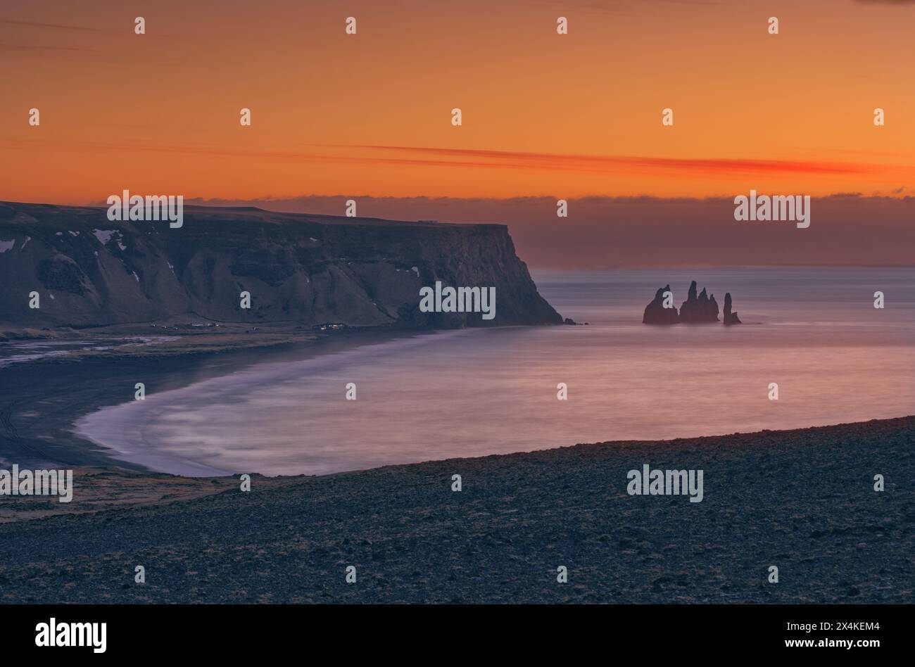 Long exposure at sunrise of the sea stacks offshore from Vik, Iceland ...