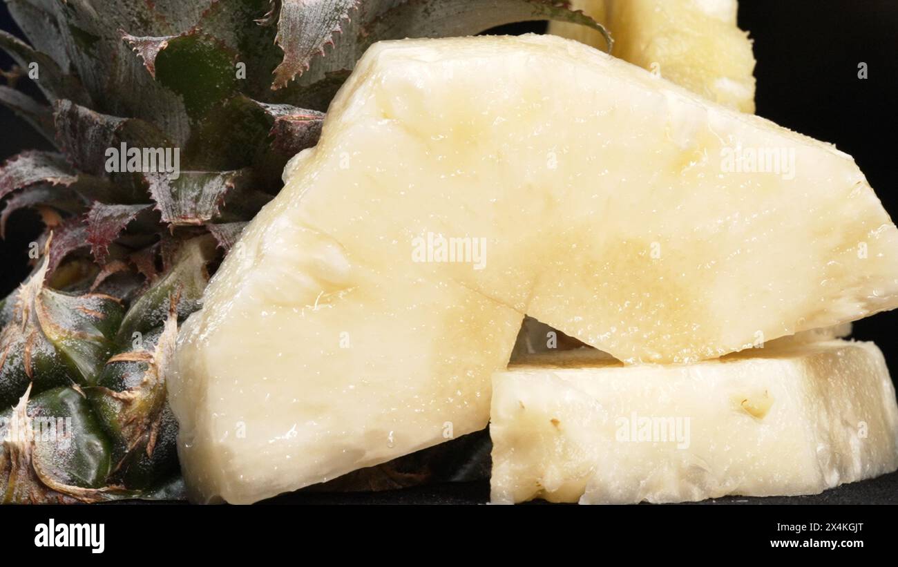 Close up video of fresh pineapple with slice of peel pineapple insert ...