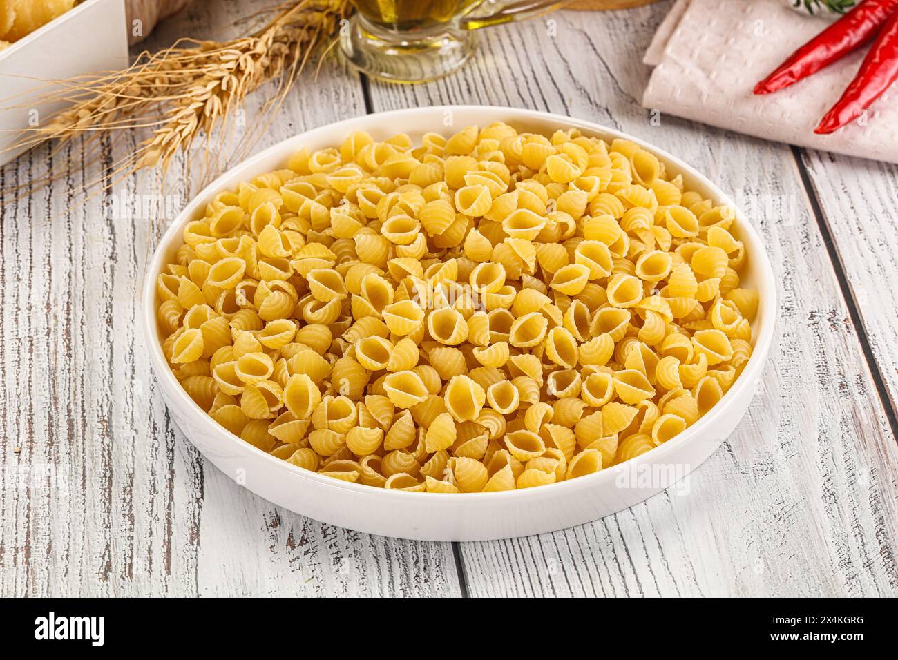 Italian cuisine - dry conchiglie shell pasta Stock Photo - Alamy