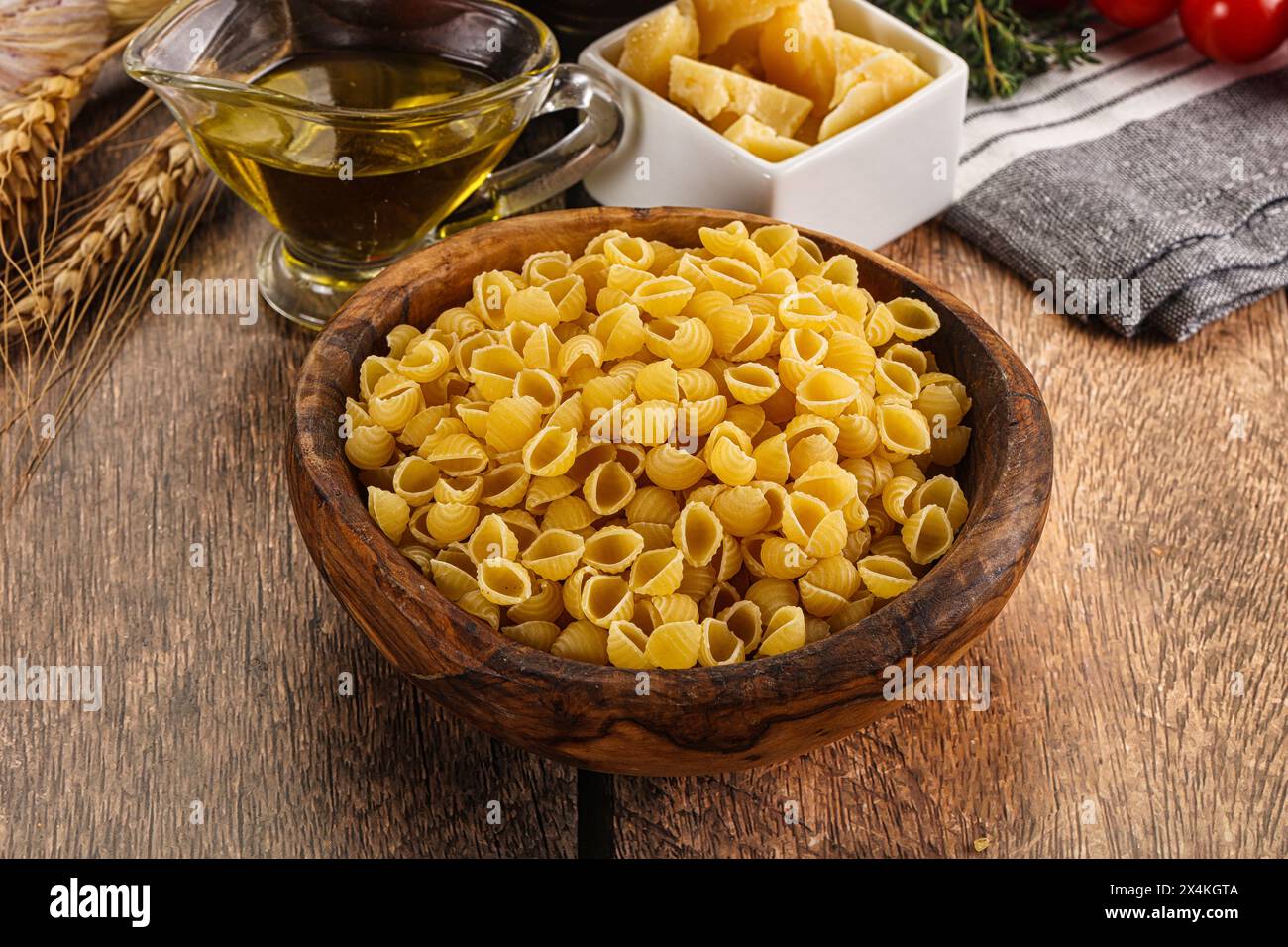 Italian cuisine - dry conchiglie shell pasta Stock Photo - Alamy