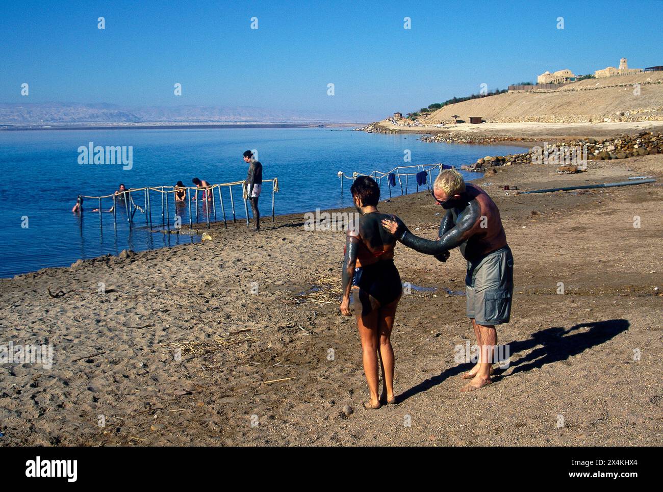Couple applying Dead Sea mineral mud, taken in 2000, Dead Sea; Jordan ...