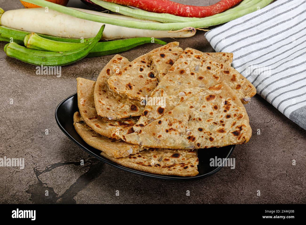 Indian vegetarian Aloo Paratha - bread with potato Stock Photo - Alamy