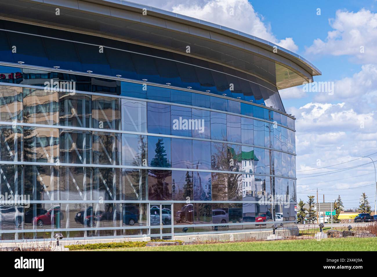 glass walled office building and mall in city downtown Stock Photo - Alamy