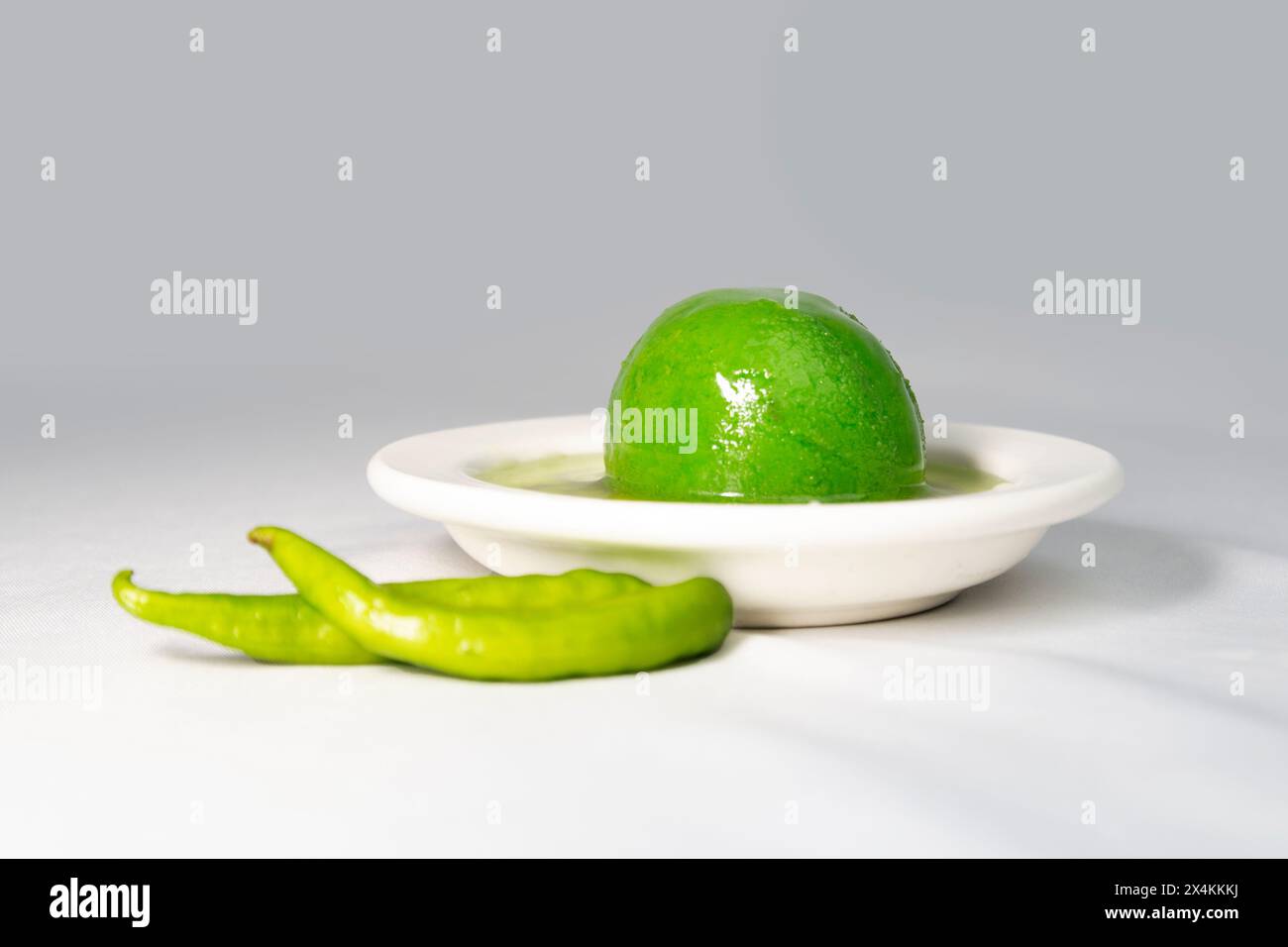 Chili sweets on plate. green colored, chilli flavored, hot and sweet ...