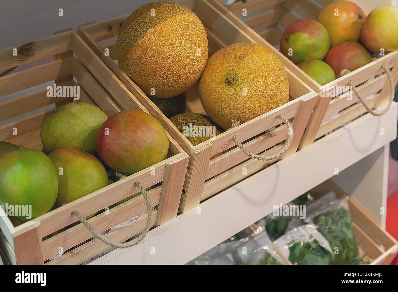 Melon, pomelo, citrus fruits on the counter of a vegetable store. Food ...