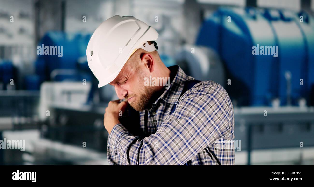 Engineer With Shoulder Pain Injury After Accident At Power Plant Stock ...