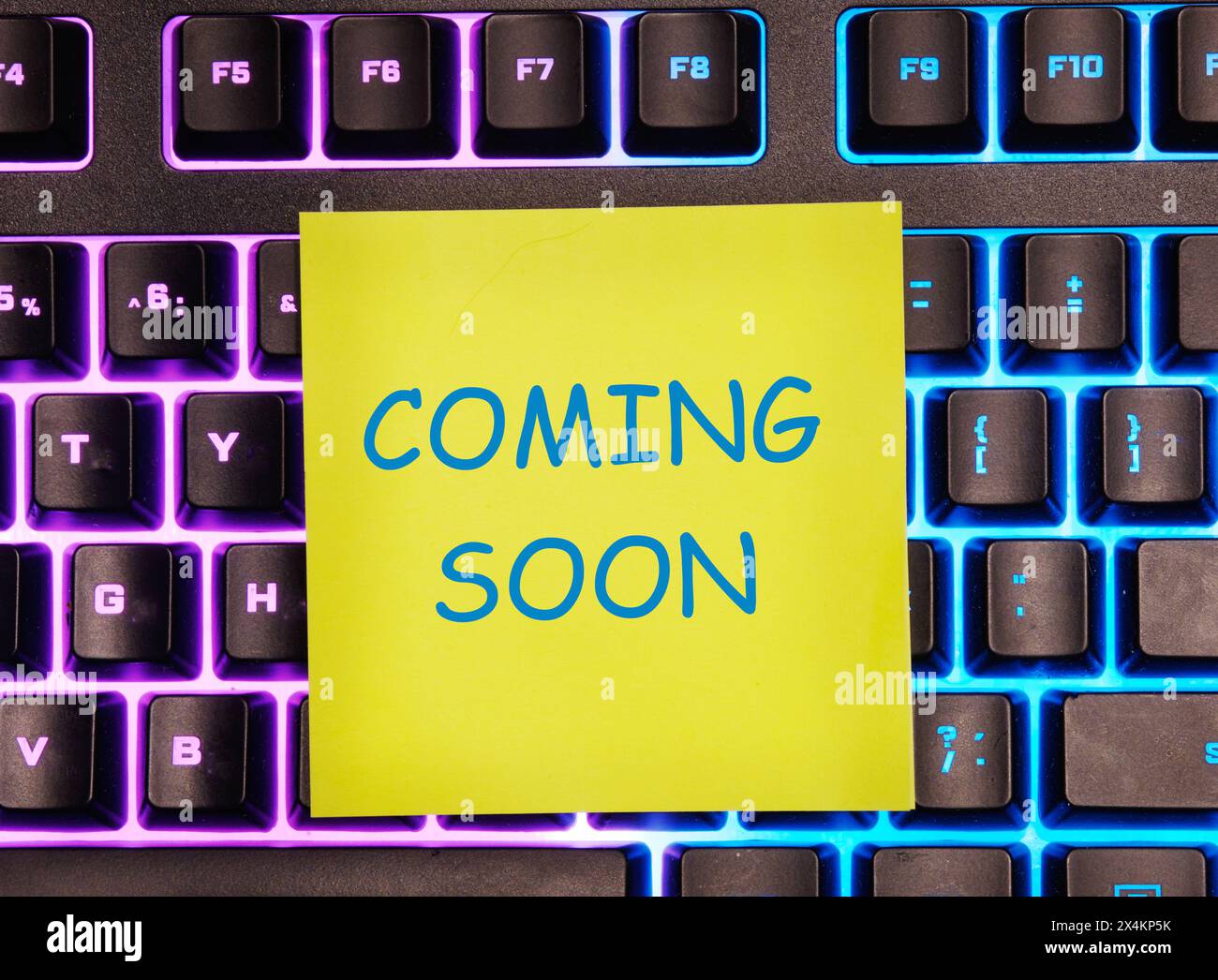 The words coming soon it is written on a yellow sticker on the ...
