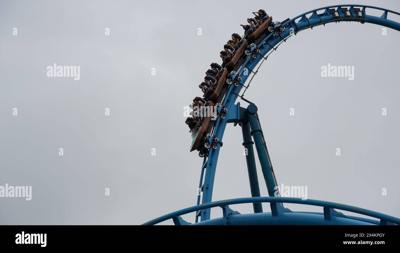 People have fun on the launch roller coaster "Abyssus" at the amusement ...
