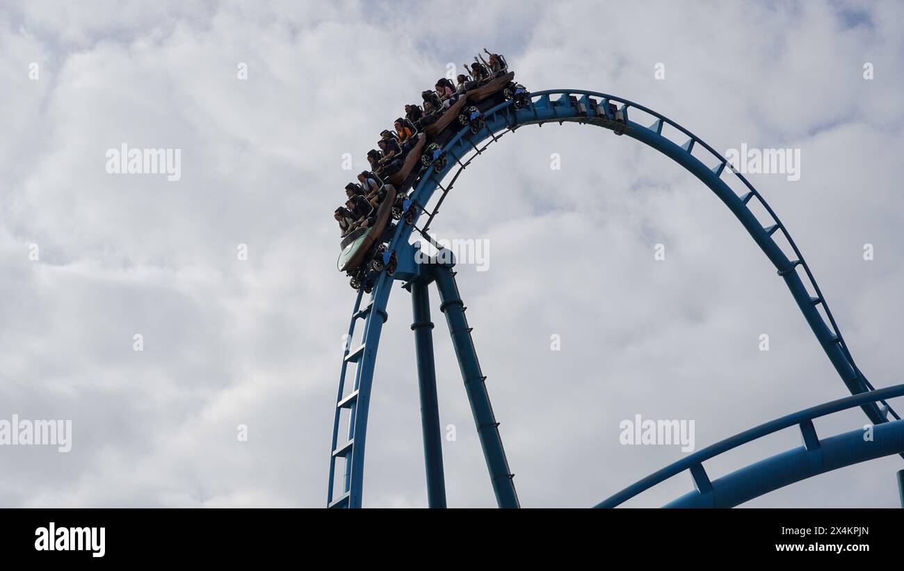 People have fun on the launch roller coaster "Abyssus" at the amusement ...