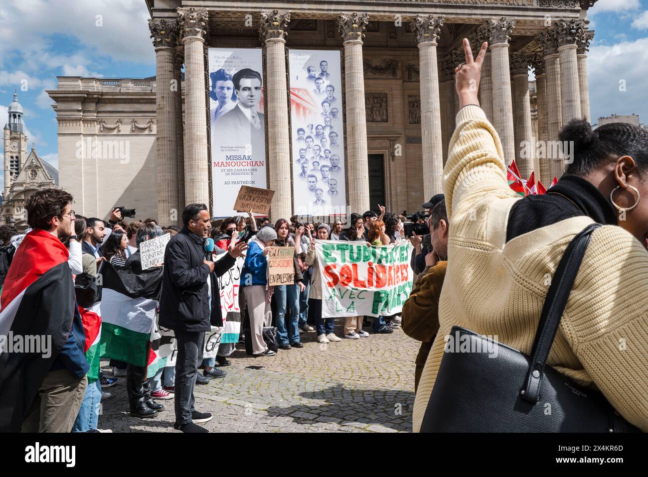 A student with her back to the V of Victory. Demonstration in support ...