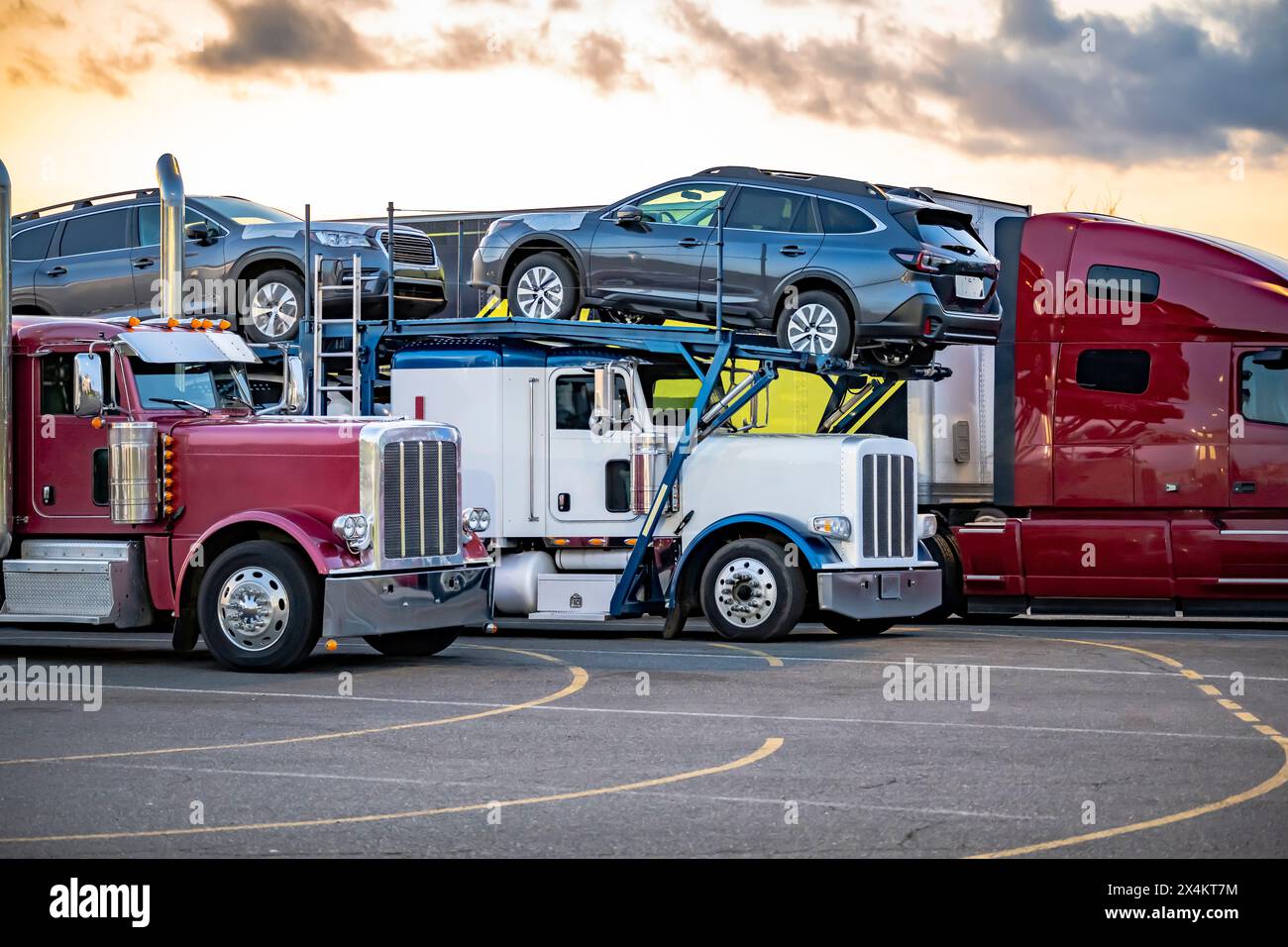 Industrial carriers different big rig semi trucks tractors with loaded ...