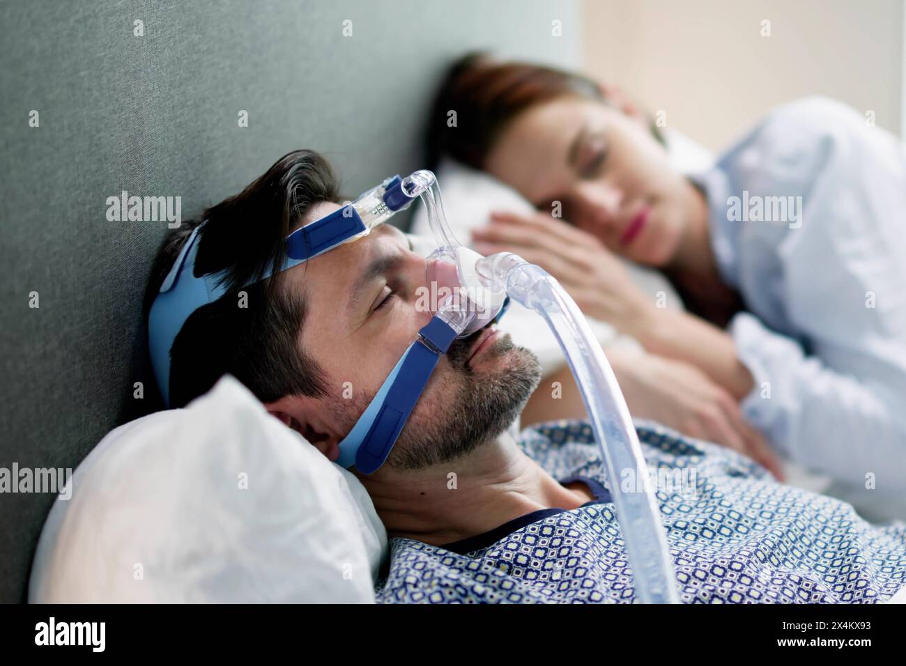 Woman wearing sleep apnea CPAP mask machine disorder Stock Photo - Alamy