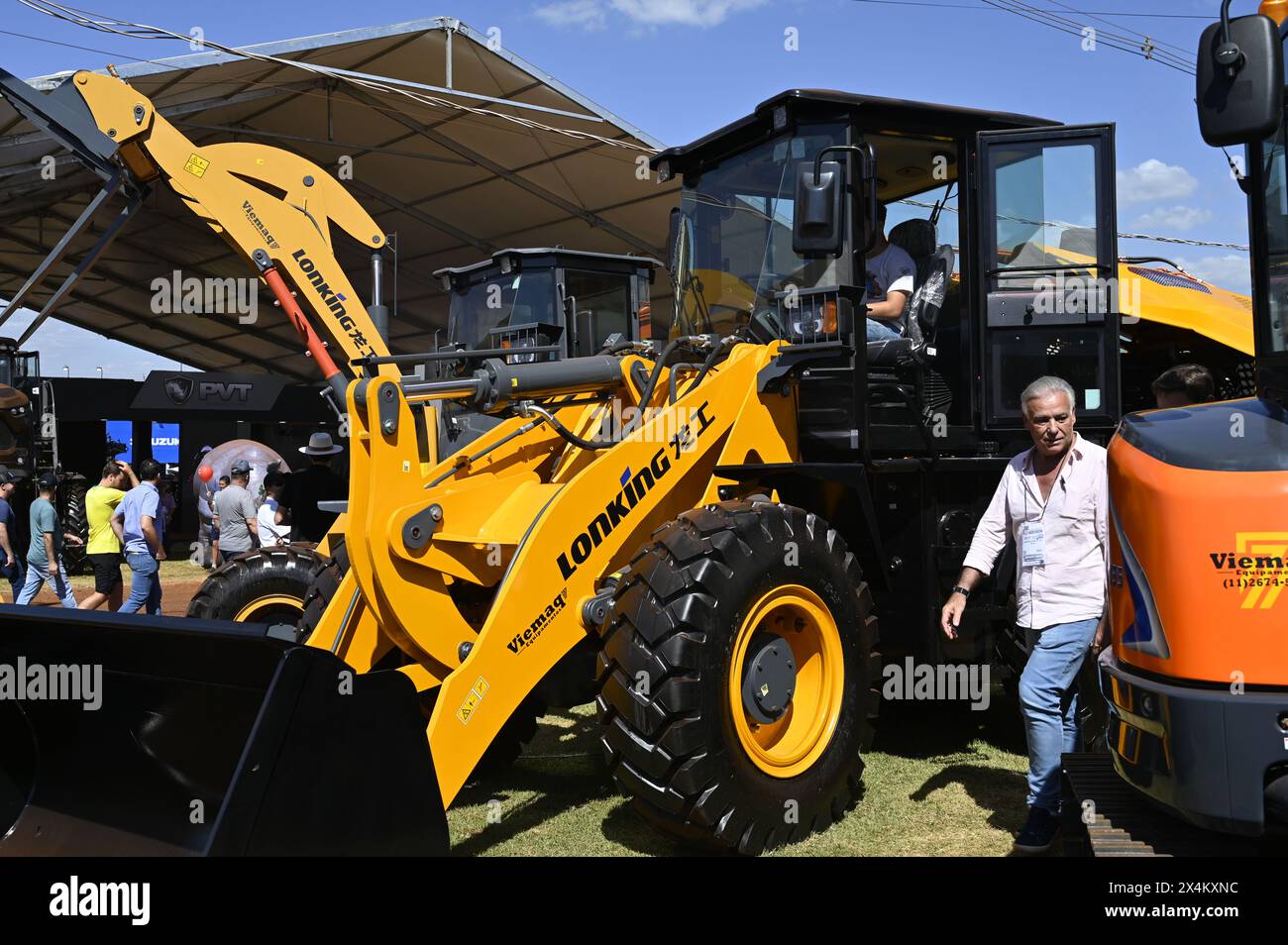 Sao Paulo, Brazil. 2nd May, 2024. Visitors learn about a Lonking wheel ...