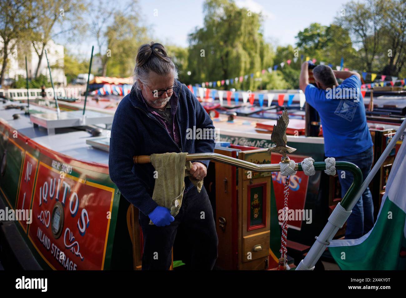 London, UK. 04th May, 2024. Narrowboat owners polish brass on their ...