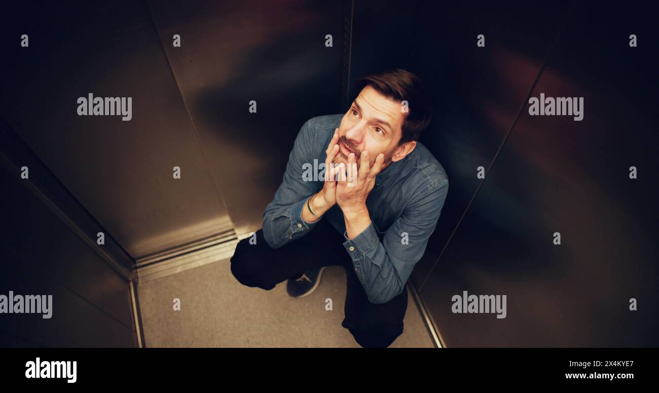 Man claustrophobia elevator hi-res stock photography and images - Alamy