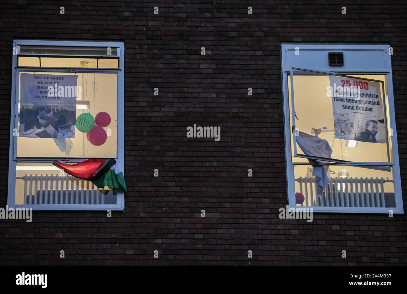 Posters on windows hi-res stock photography and images - Alamy