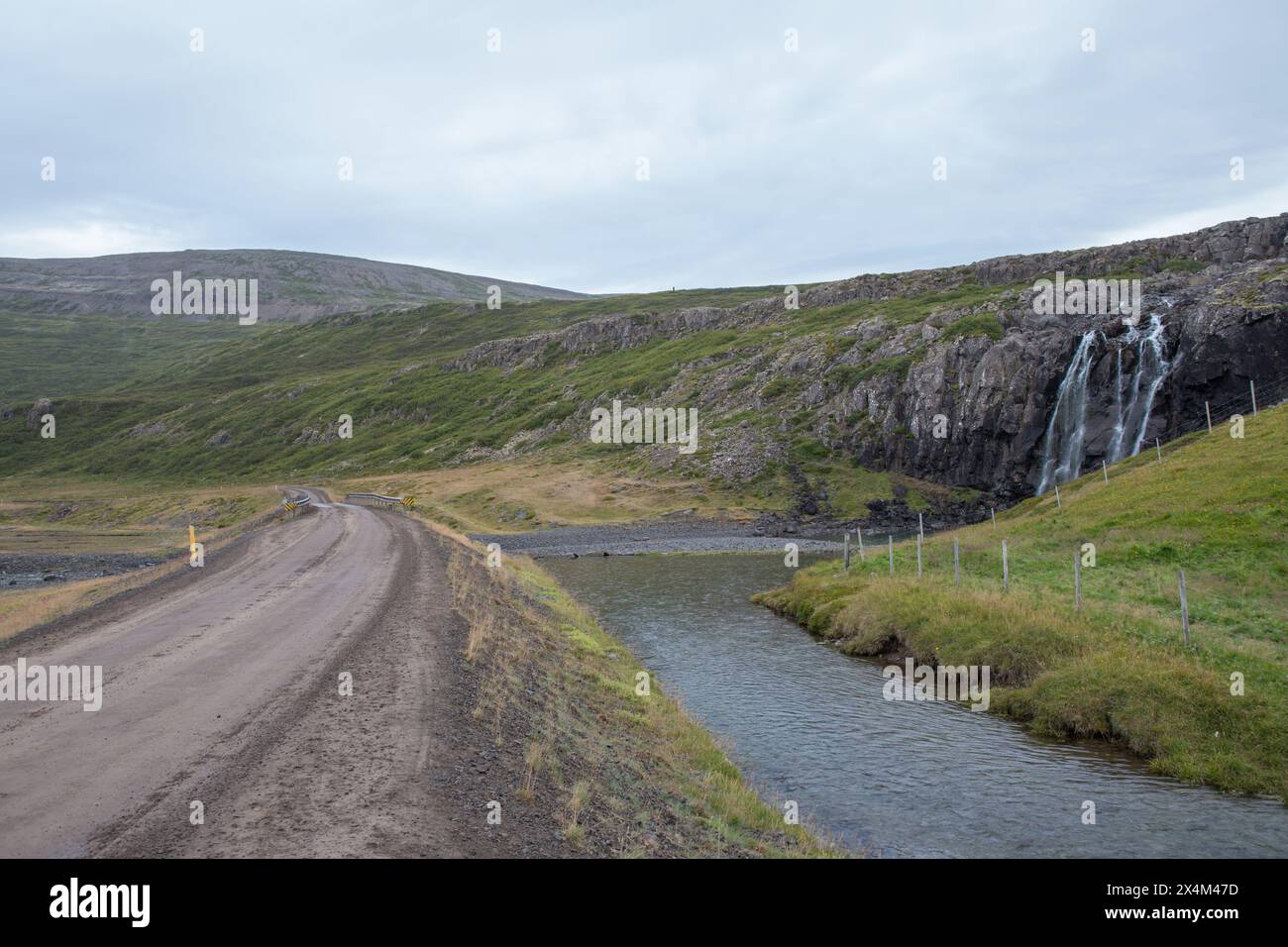 Waterfall Foss in Fossfjordur in the westfjords of Iceland Stock Photo ...