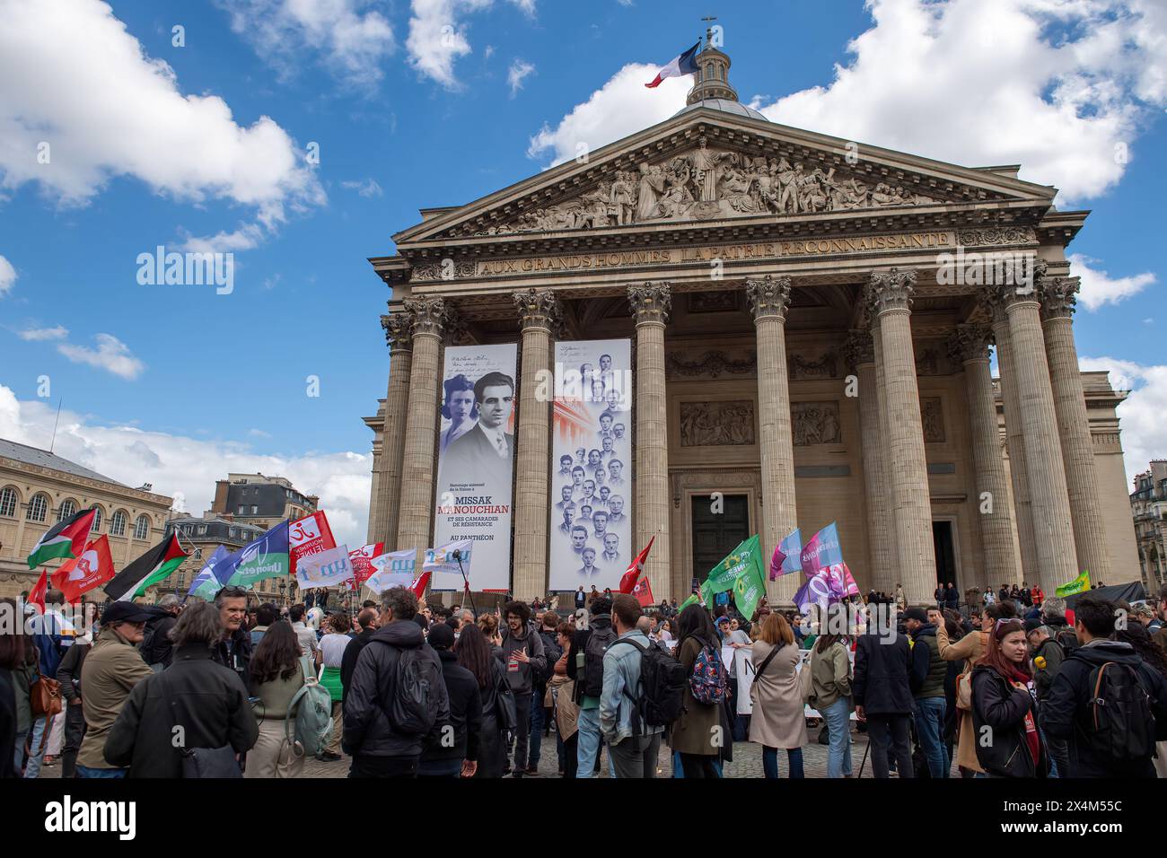 Students wave flags and chant slogans in the shadow of the Pantheon ...