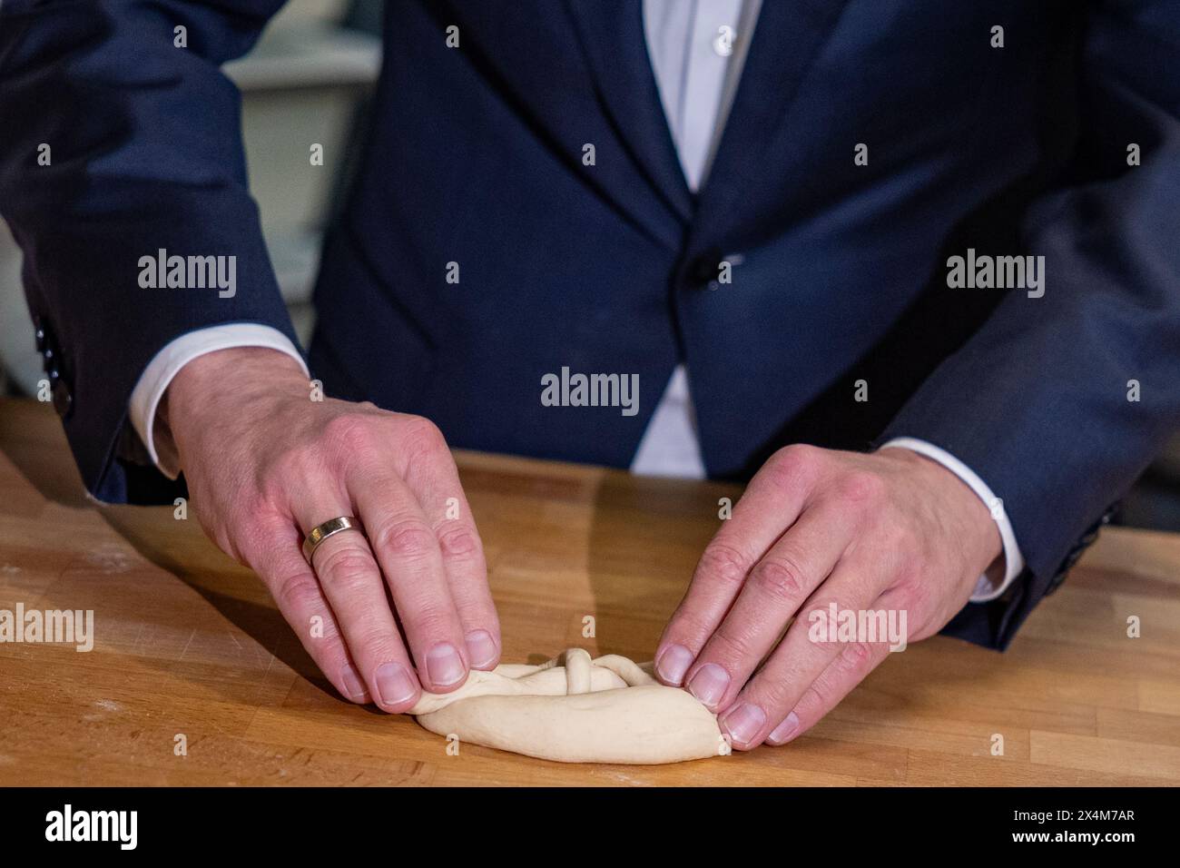 29 April 2024, Berlin: The hands of Federal Chancellor Olaf Scholz (SPD ...