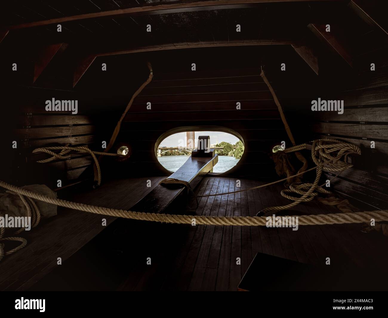 Interior of the stern area with the rudder for steering in the wooden ...