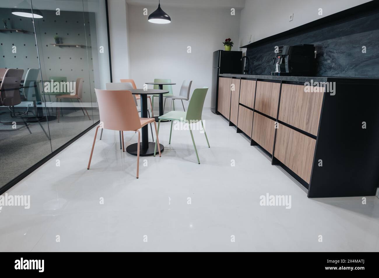Modern office break room with stylish furniture and kitchenette Stock ...