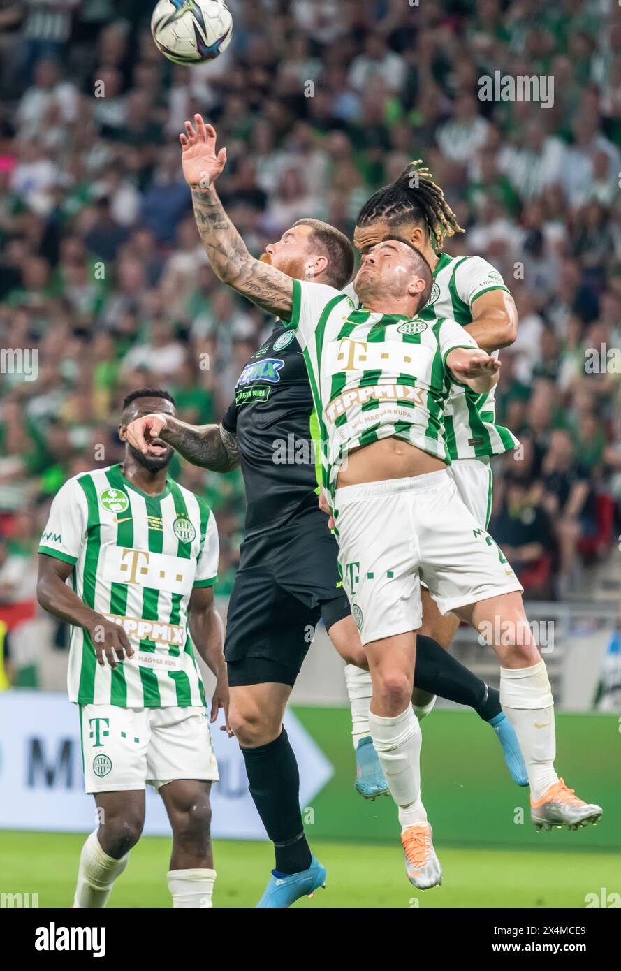 Budapest, Hungary – May 11, 2022. Paks striker Martin Adam in header ...