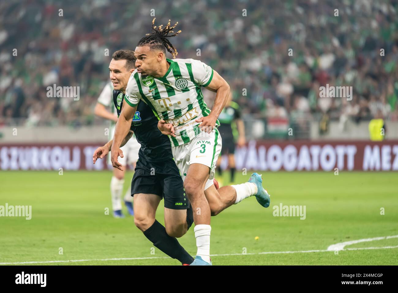 Budapest, Hungary – May 11, 2022. Ferencvaros defender Samy Mmaee and ...