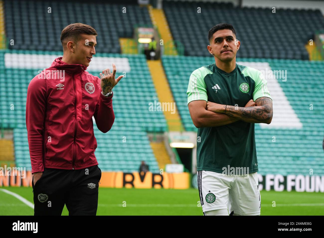Heart of Midlothian's Kenneth Vargas (left) with Celtic’s Luis Palma ...