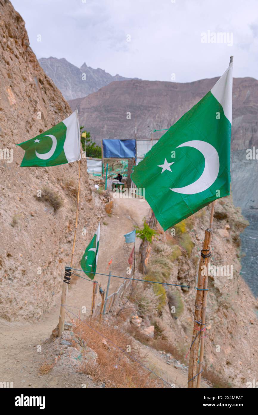Trekking to Hopper Glacier in Pakistan. Pakistan national flag Stock ...