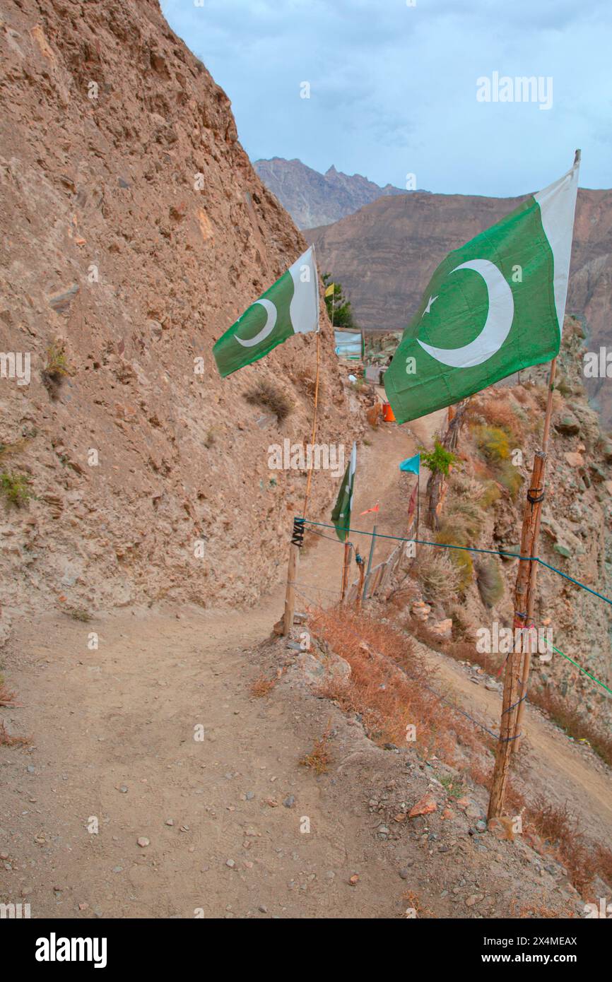 Trekking to Hopper Glacier in Pakistan. Pakistan national flag Stock ...
