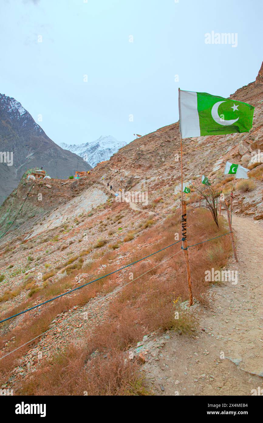Trekking to Hopper Glacier in Pakistan. Pakistan national flag Stock ...