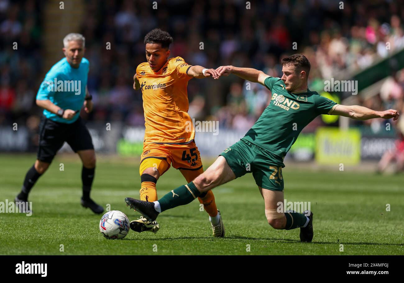 Hull City's Fabio Carvalho and Plymouth Argyle's Adam Randell in action ...