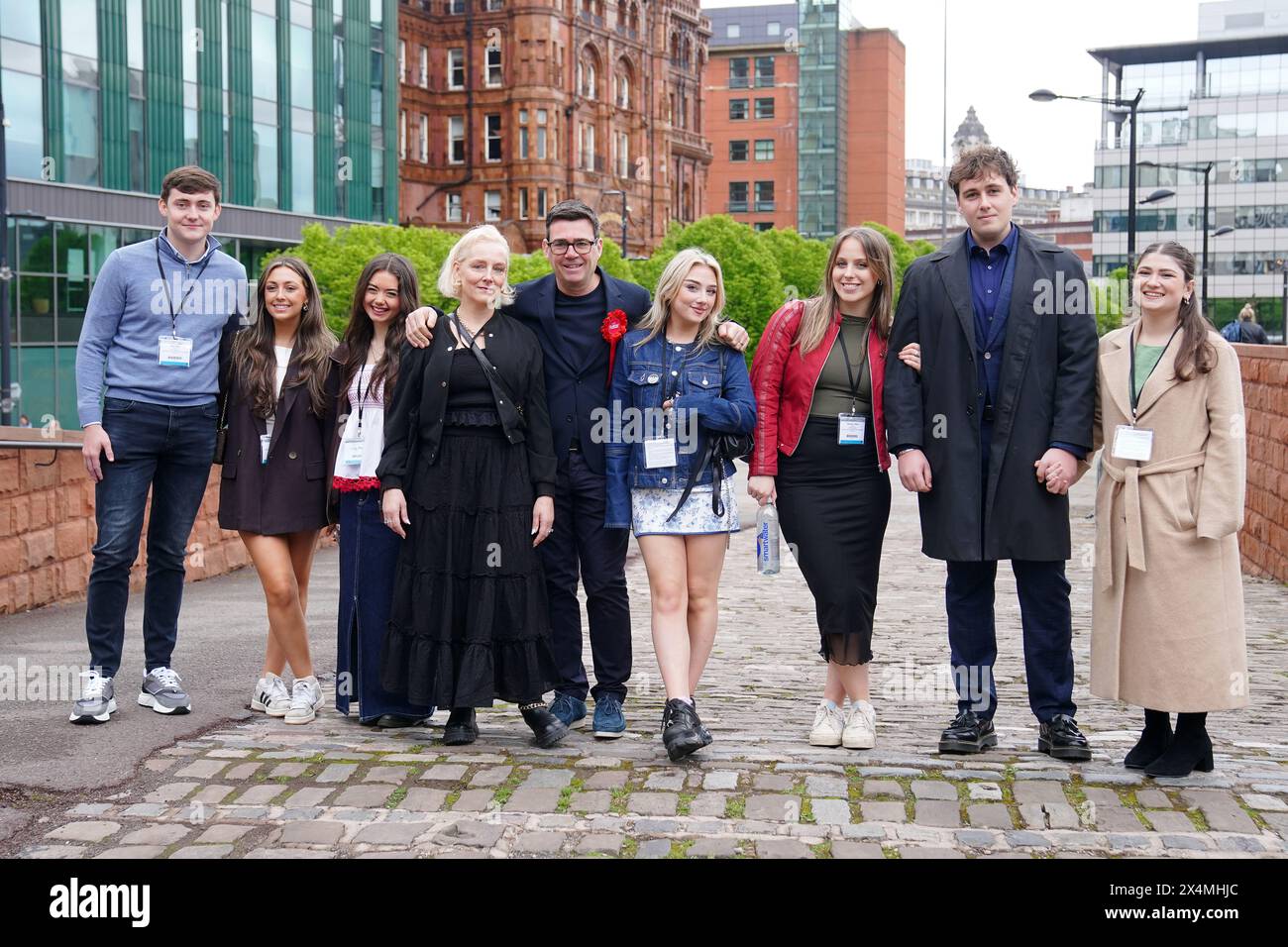 Andy burnham with his wife marie france arrive with their family at ...