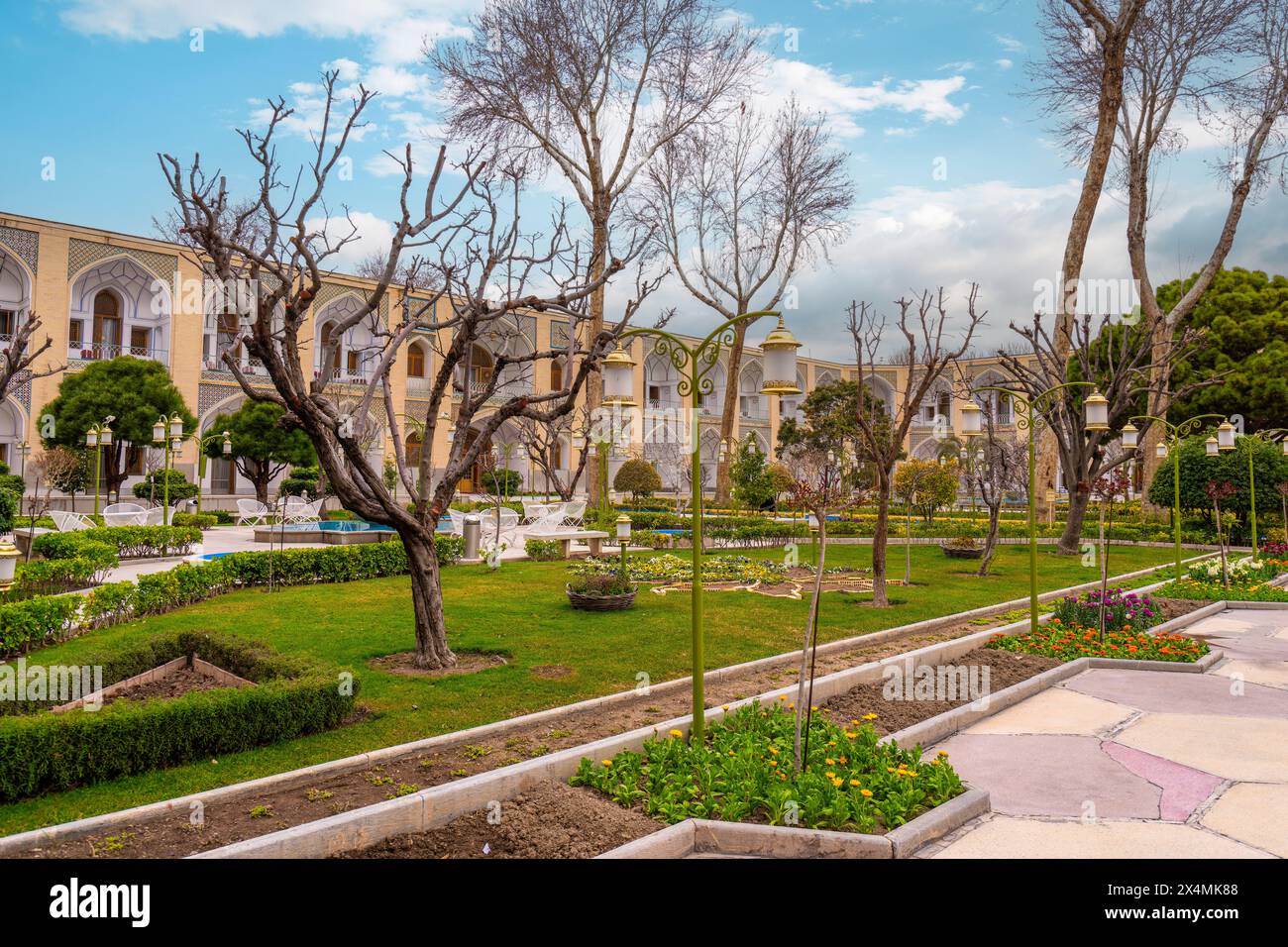 Abbasi Hotel, Iran - March 4, 2024: Lush gardens and classical Persian ...