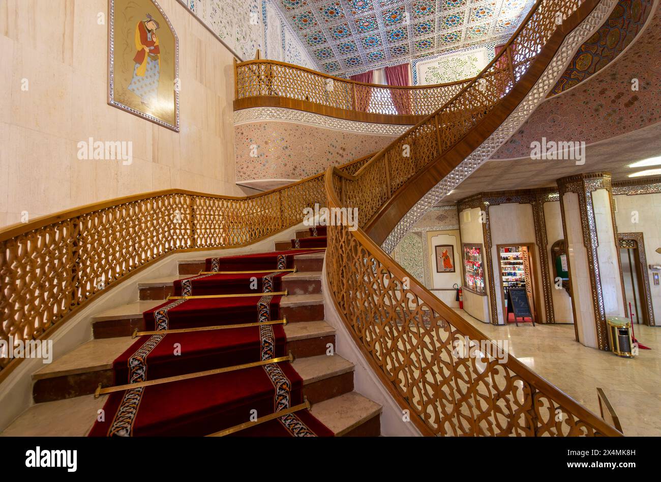 Abbasi Hotel, Iran - March 4, 2024: A grand staircase with red carpet ...