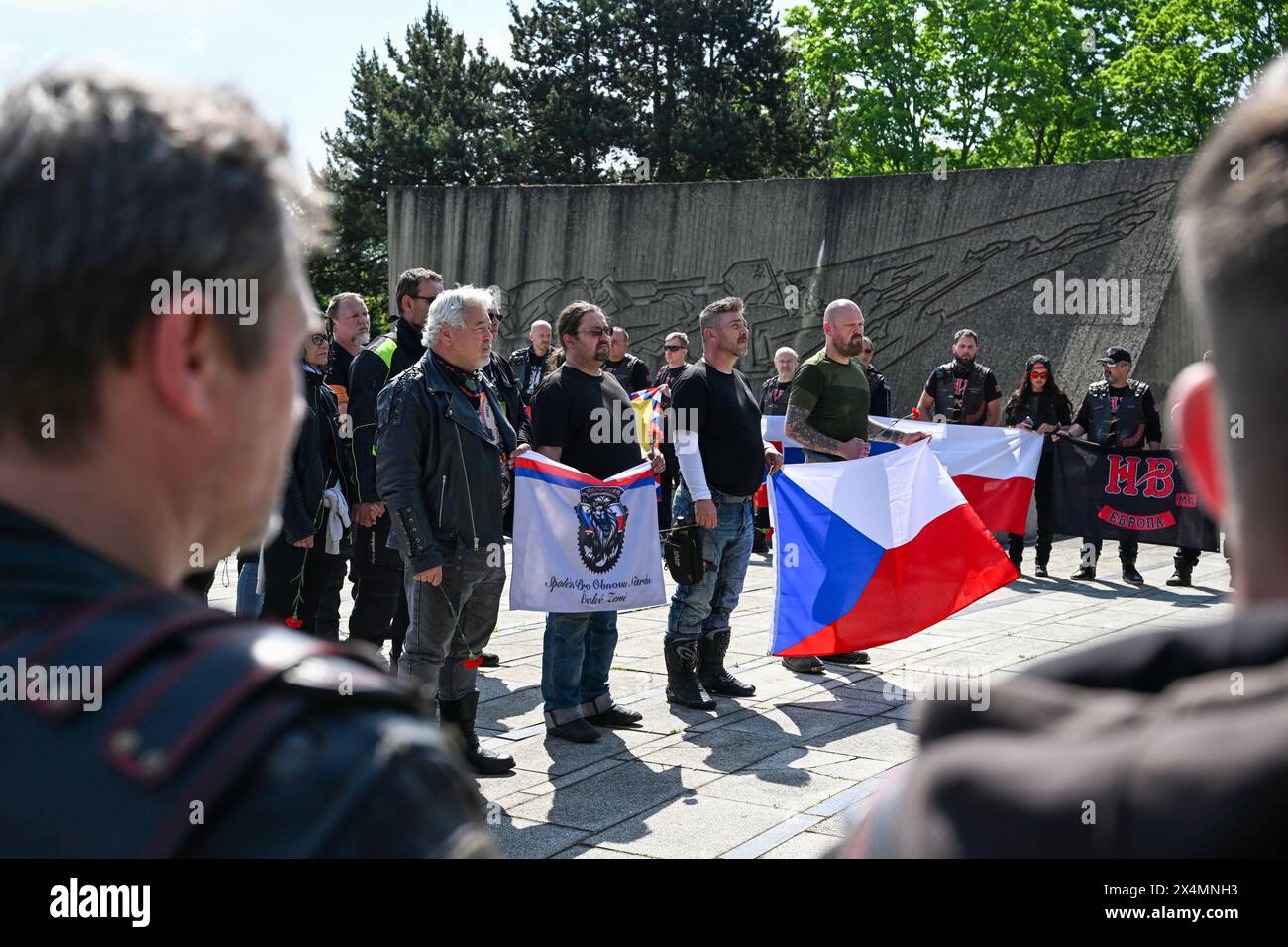 A large banner with the inscription "We welcome the delegates of the ...