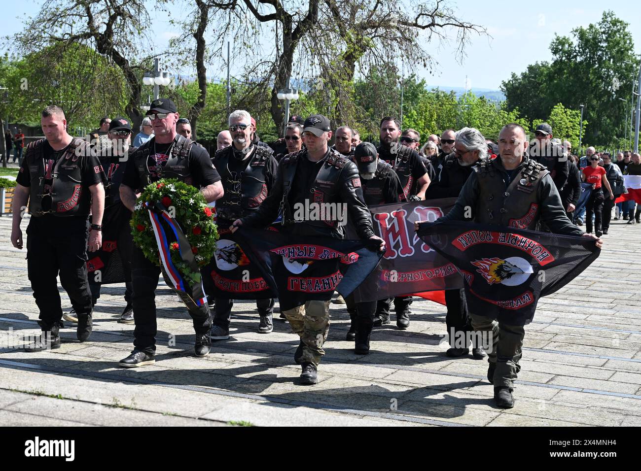 A large banner with the inscription "We welcome the delegates of the ...
