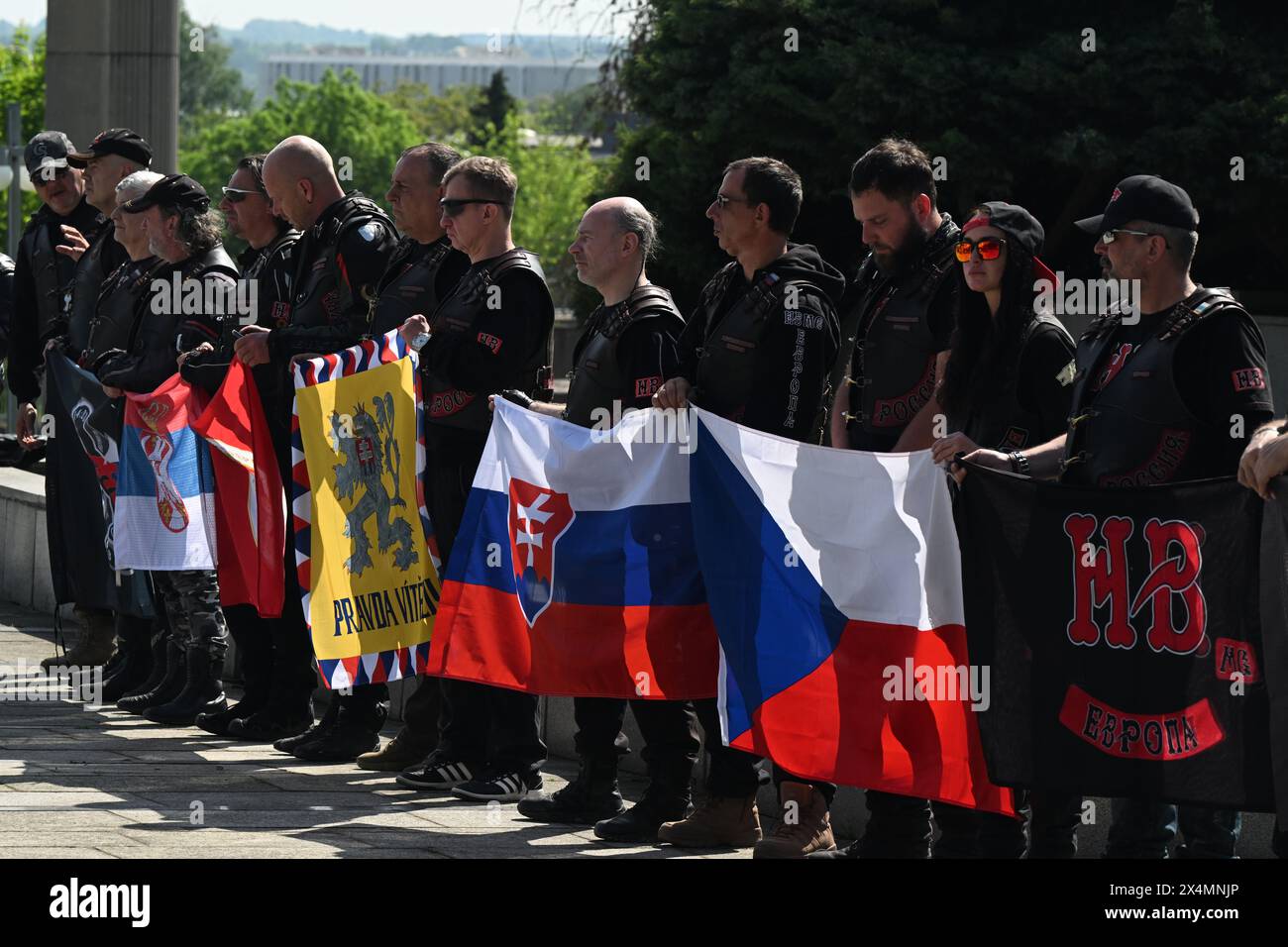 A large banner with the inscription "We welcome the delegates of the ...
