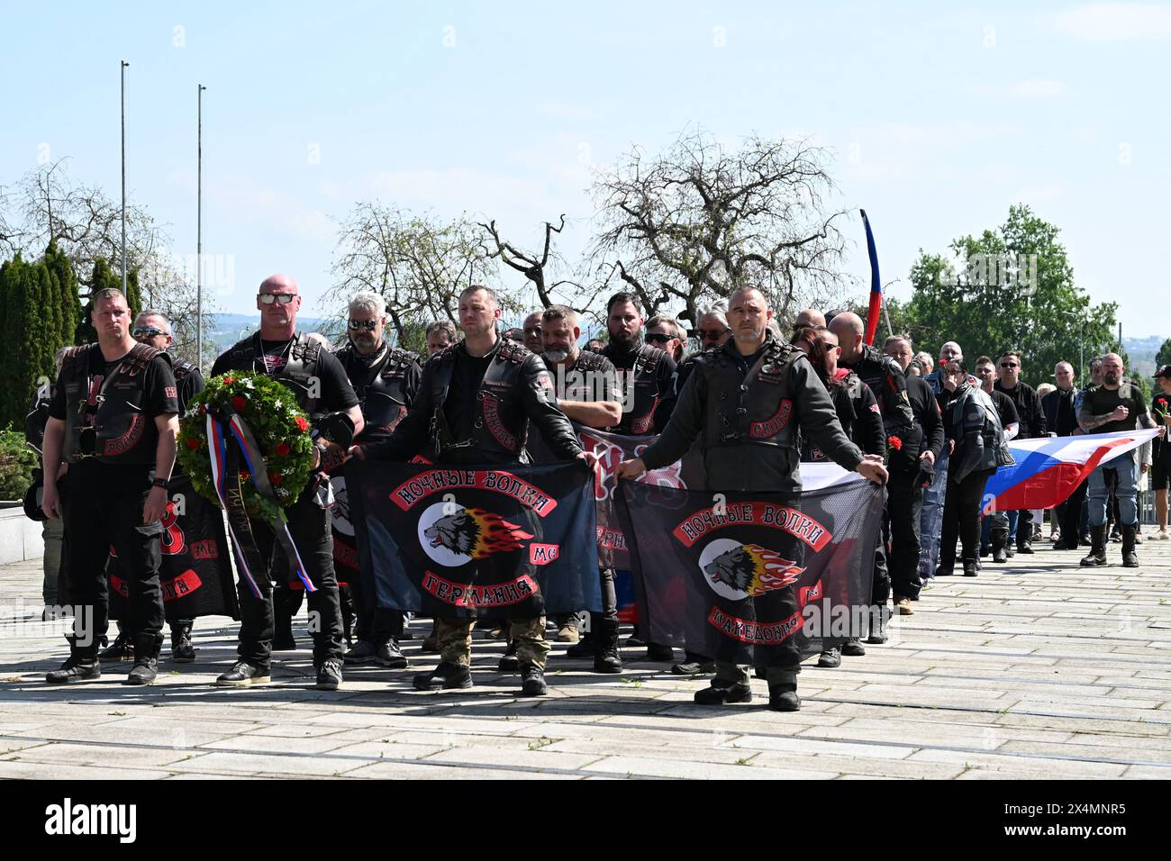 A large banner with the inscription "We welcome the delegates of the ...