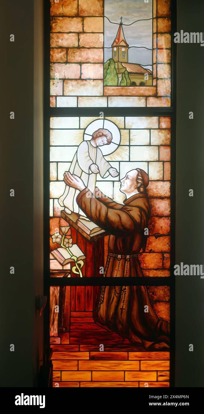 Saint Anthony of Padua, stained glass window in the church of St. Anthony of Padua and Virgin ...